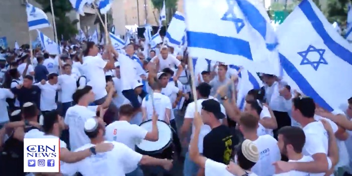 'This is Our City:' Thousands of Israelis March with Flags to Celebrate ...